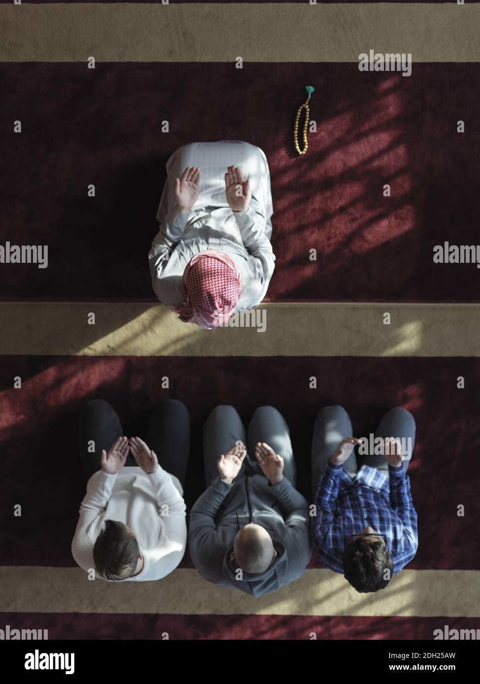Muslim people praying in mosque top view Stock Photo - Alamy