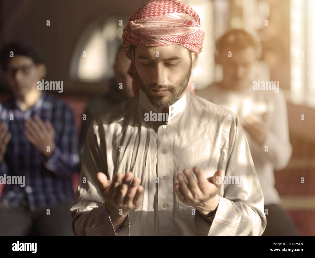Muslim people praying in mosque Stock Photo - Alamy