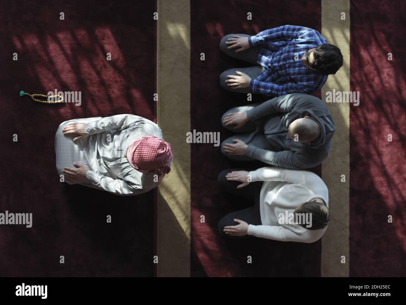 Muslim people praying in mosque top view Stock Photo - Alamy