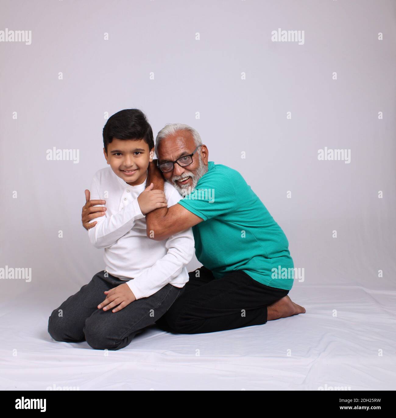 Happy Indian grandfather and grandson spending quality time Stock Photo ...