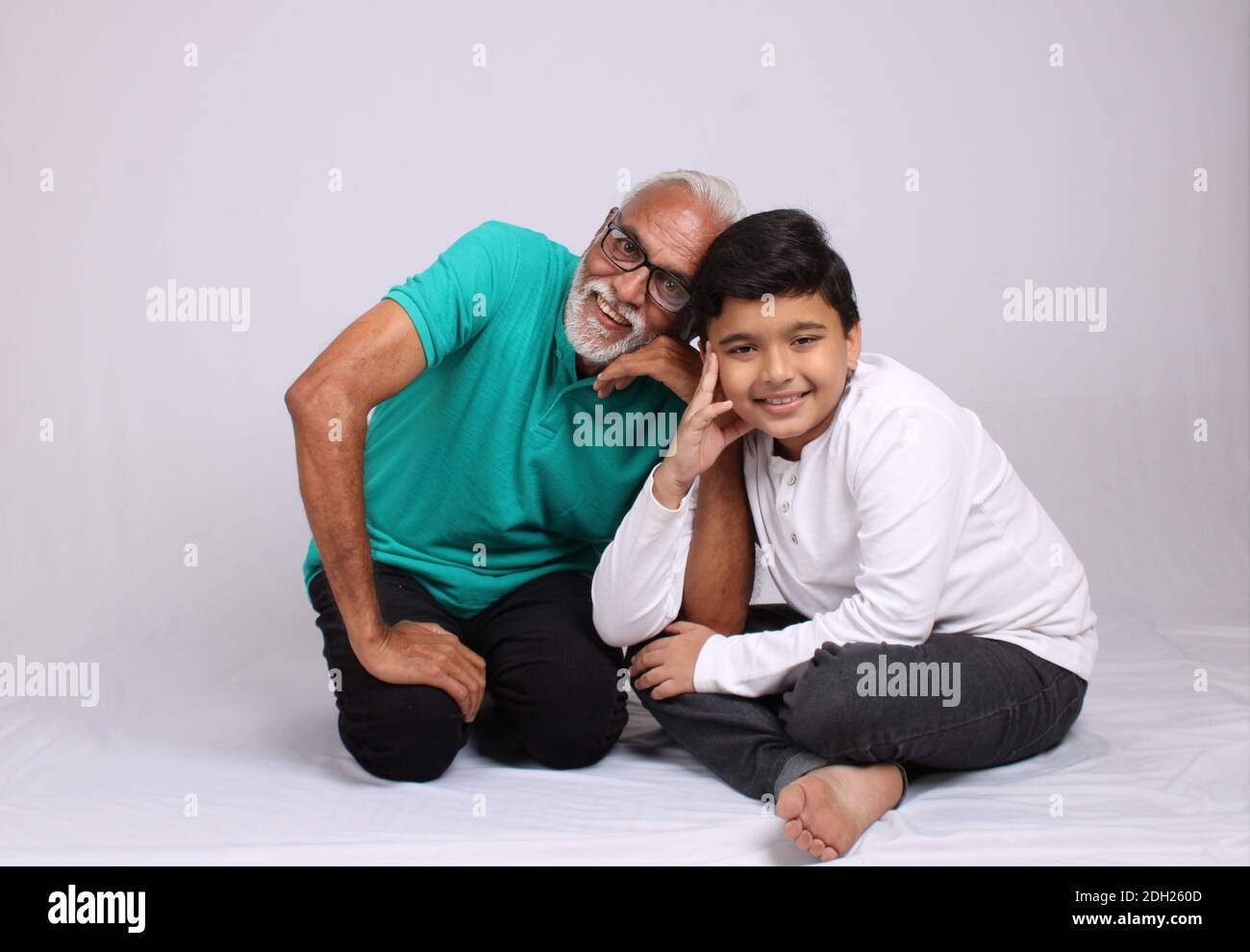 Happy Indian grandfather and grandson spending quality time Stock Photo ...