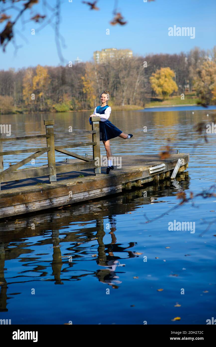 Ballerina dancing in nature park among autumn leaves Stock Photo - Alamy