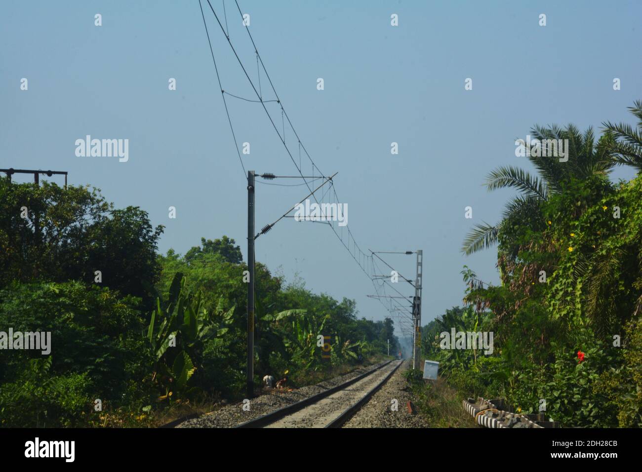 Close up of the railway lines and overhead electric traction of the ...