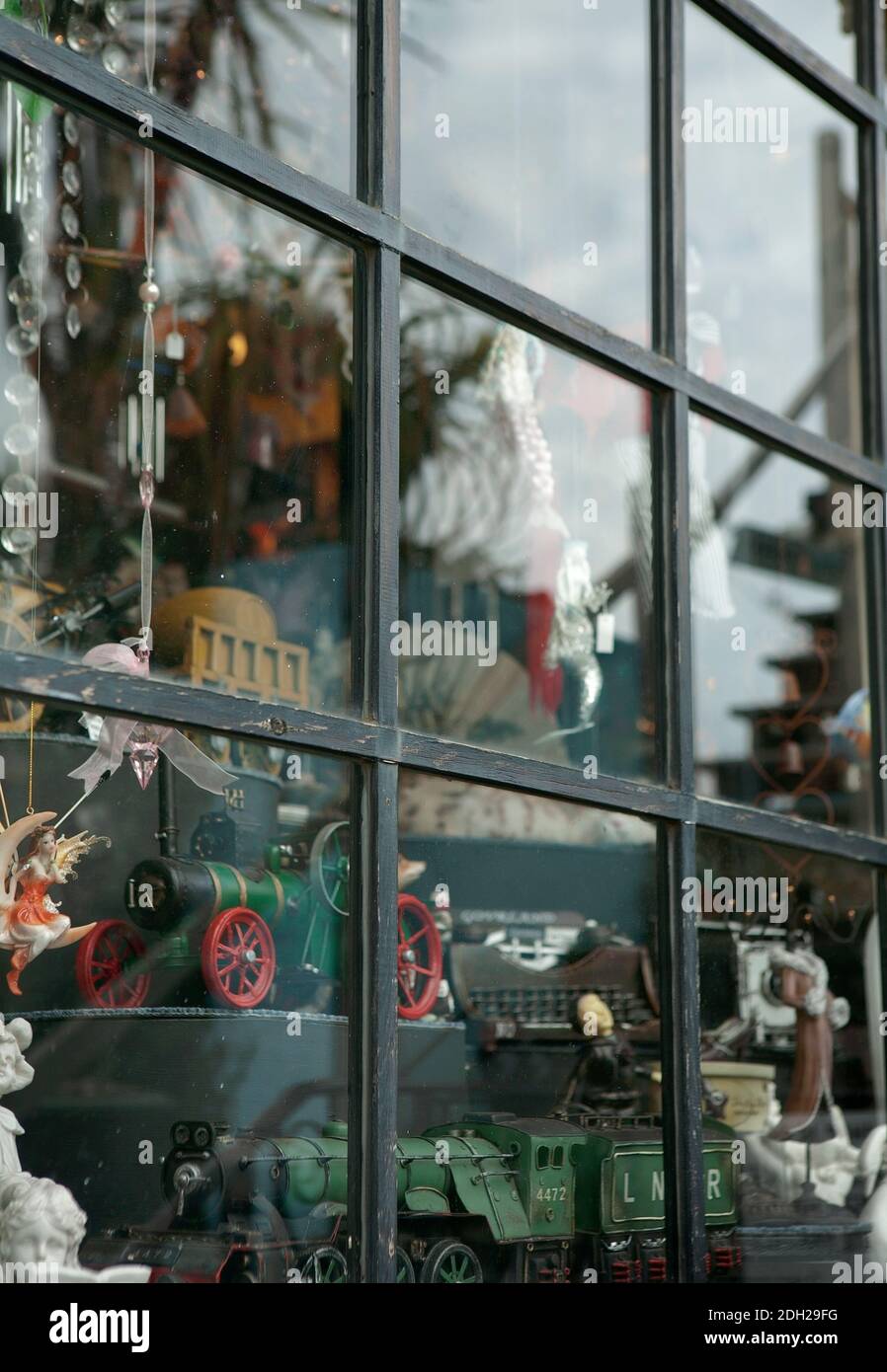 antique shop window in the uk Stock Photo - Alamy