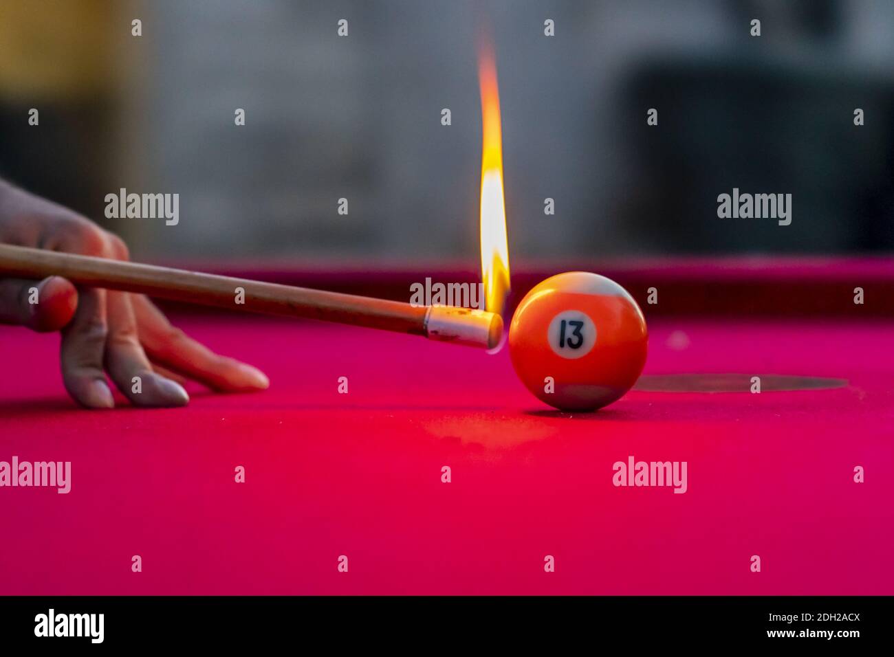Pool Balls Are Lit On Fire While Sitting On A Pool Table In An Outdoor ...