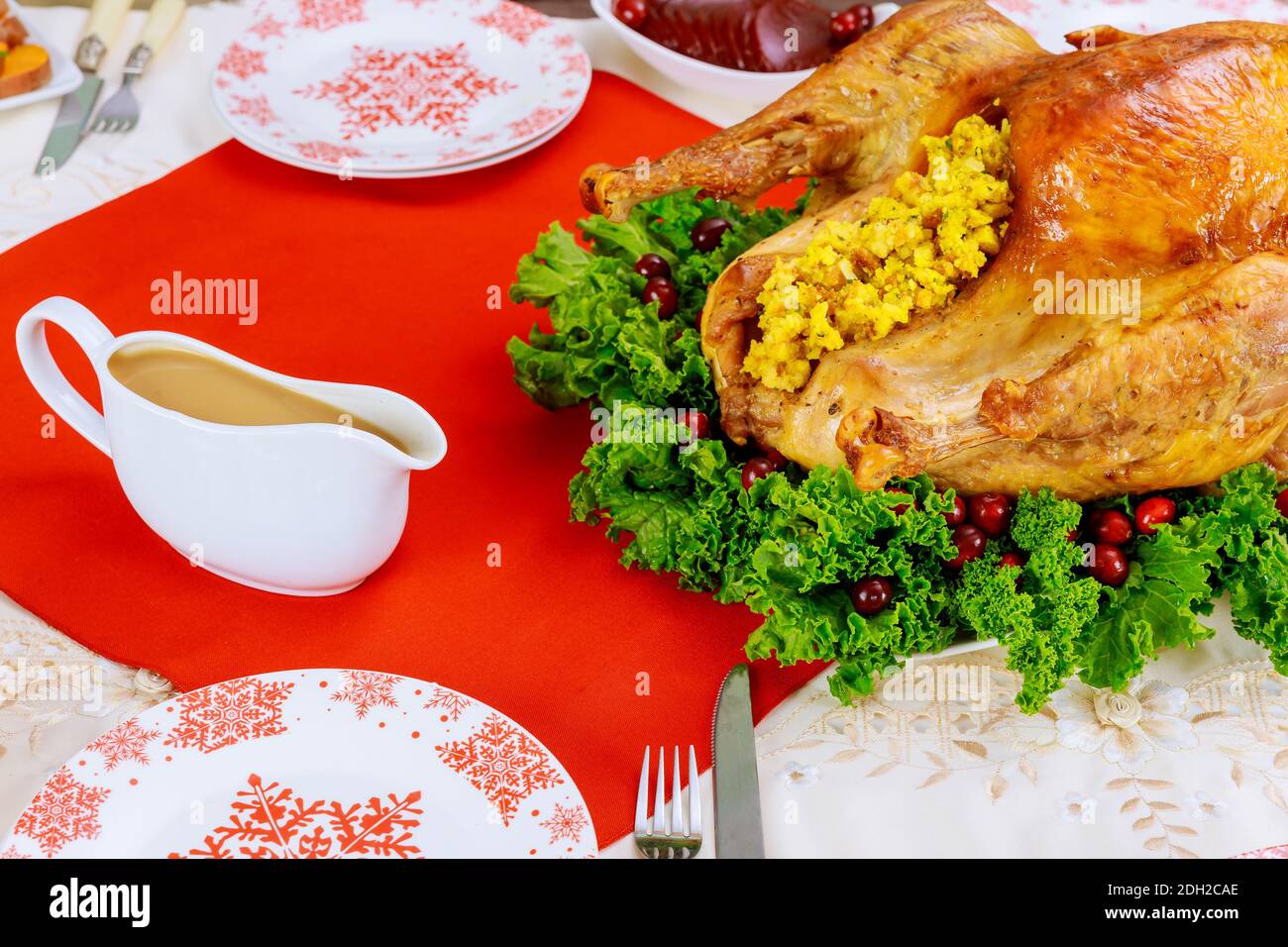 Christmas dinner with pumpkin pie. Roasted turkey garnished cranberries ...