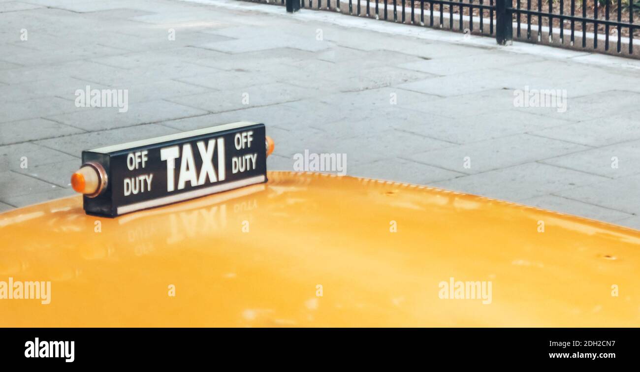 Yellow Illuminating taxi with taxi checker on gray background Color ...