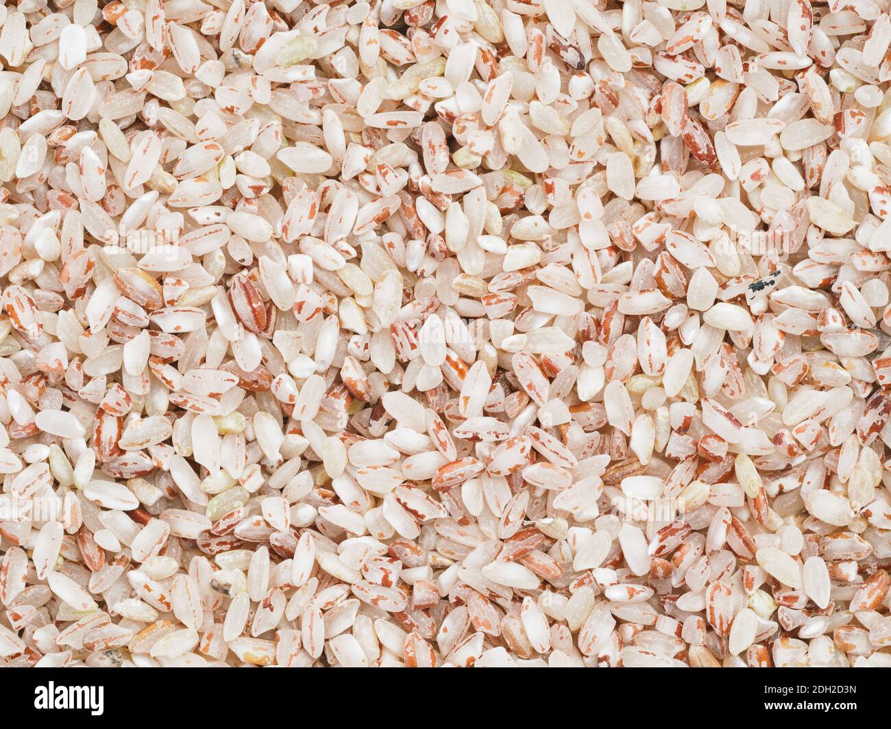 Red rice background Stock Photo - Alamy