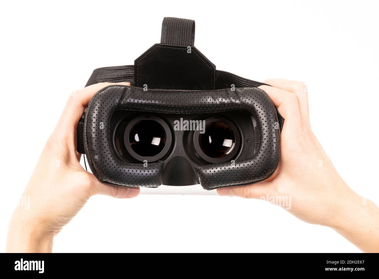 Female hands holding virtual reality googles, VR, white background ...