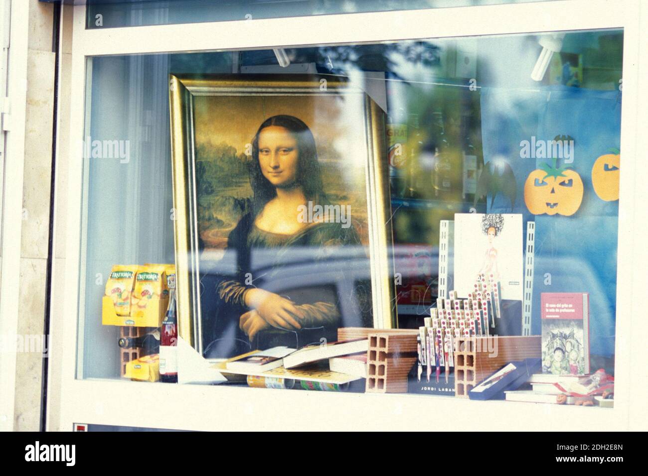a pictures of mona lisa at a shop in the old town of Valencia in Spain ...