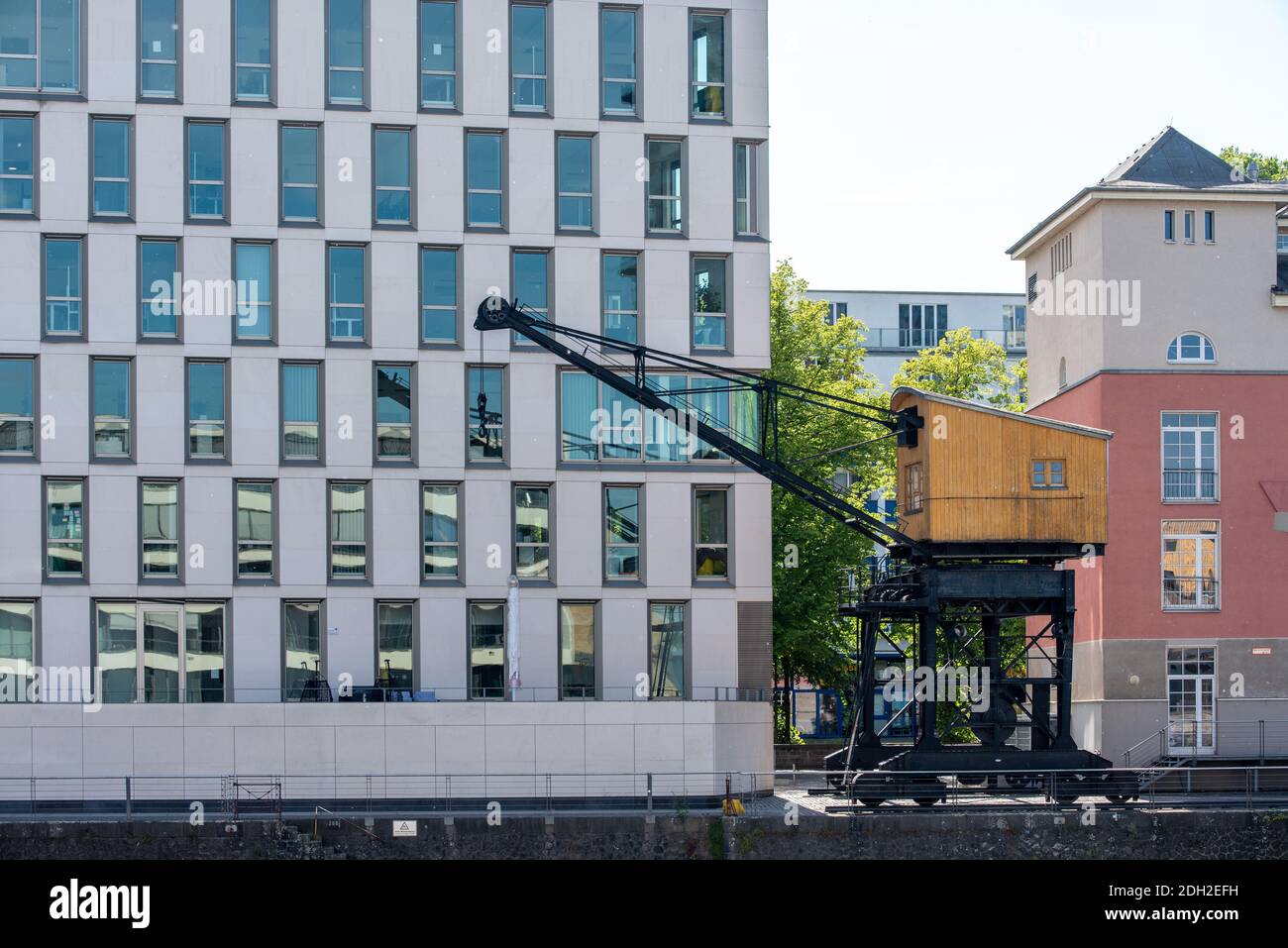 Crane lifting house hi-res stock photography and images - Alamy