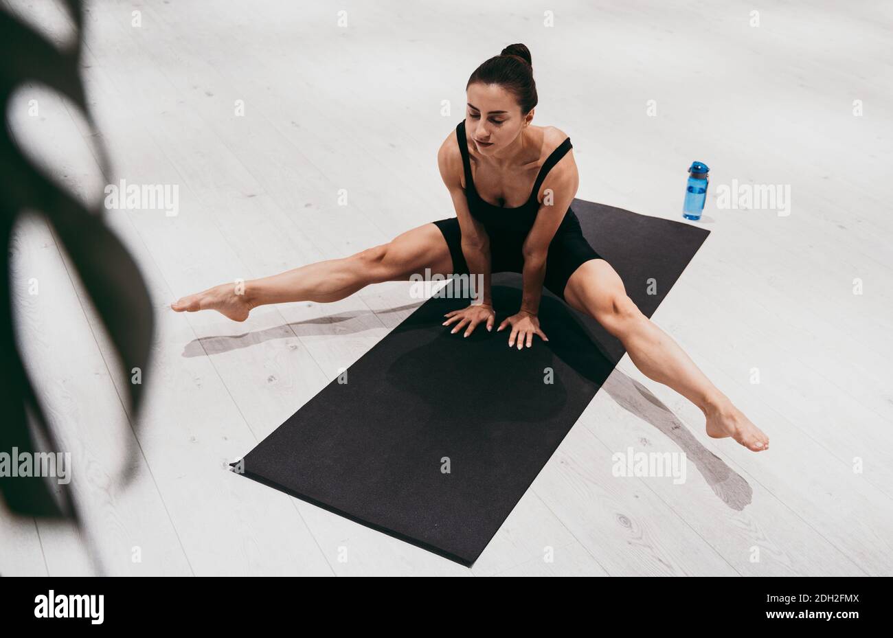 Beautiful girl training in the gym. Russian classic dancer doing ...