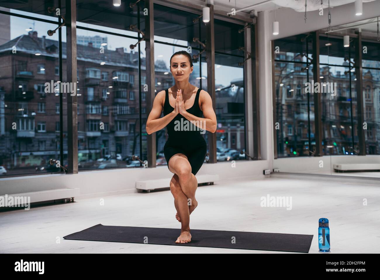 Beautiful girl training in the gym. Russian classic dancer doing ...