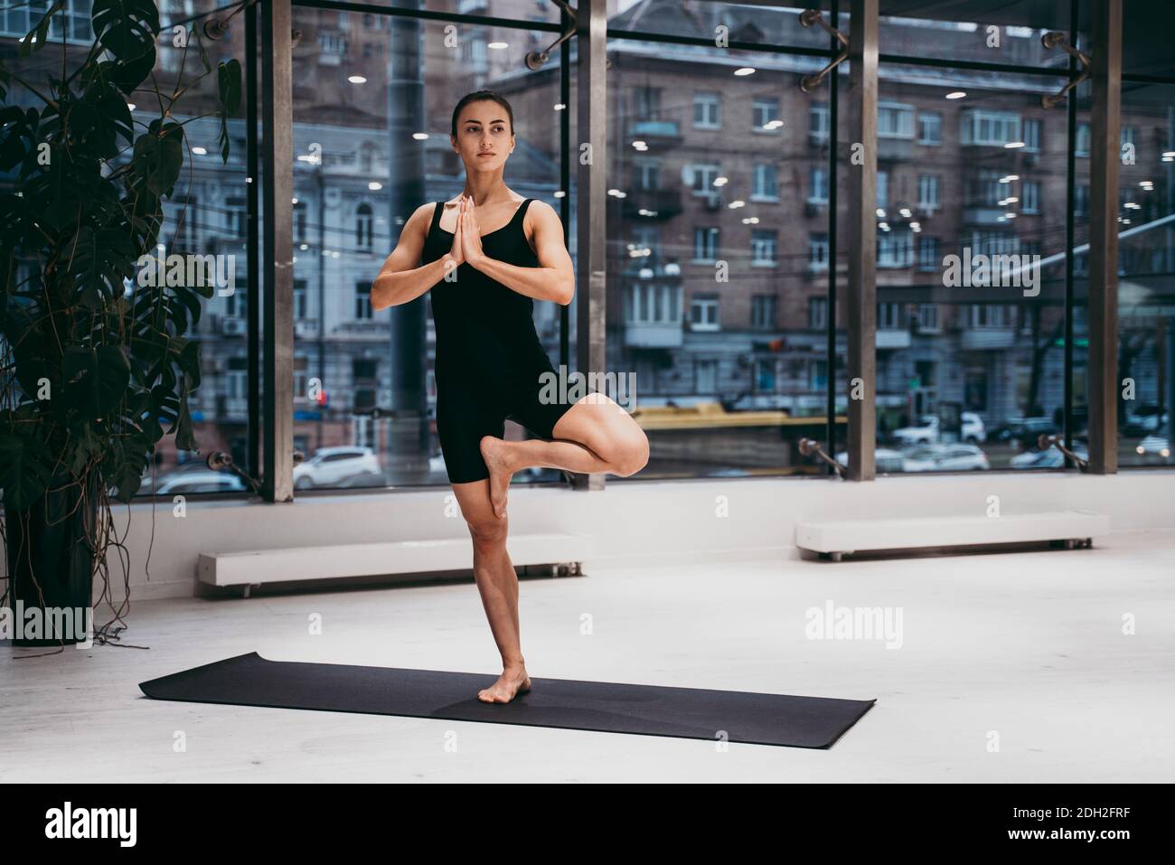 Beautiful girl training in the gym. Russian classic dancer doing ...