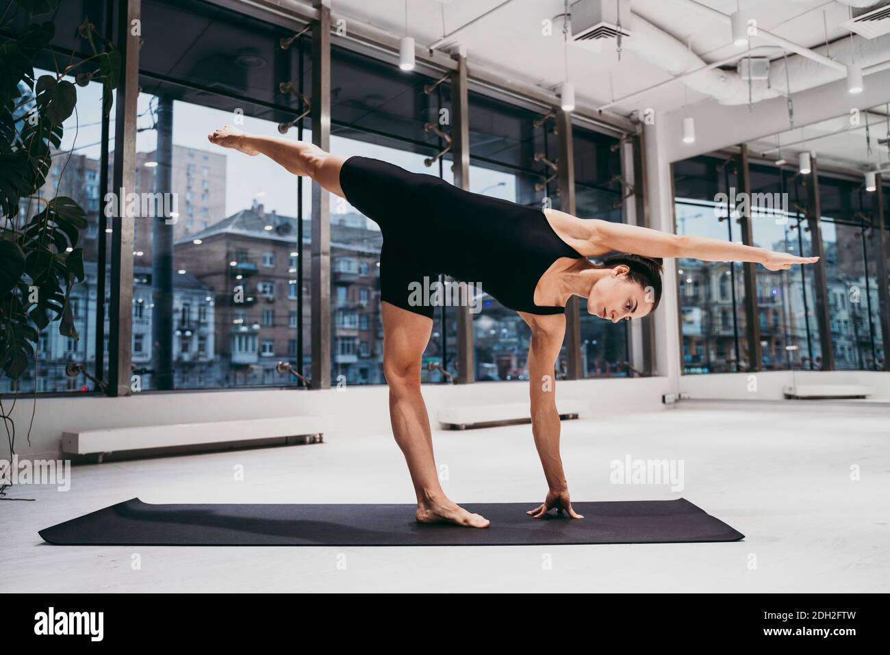 Beautiful girl training in the gym. Russian classic dancer doing ...