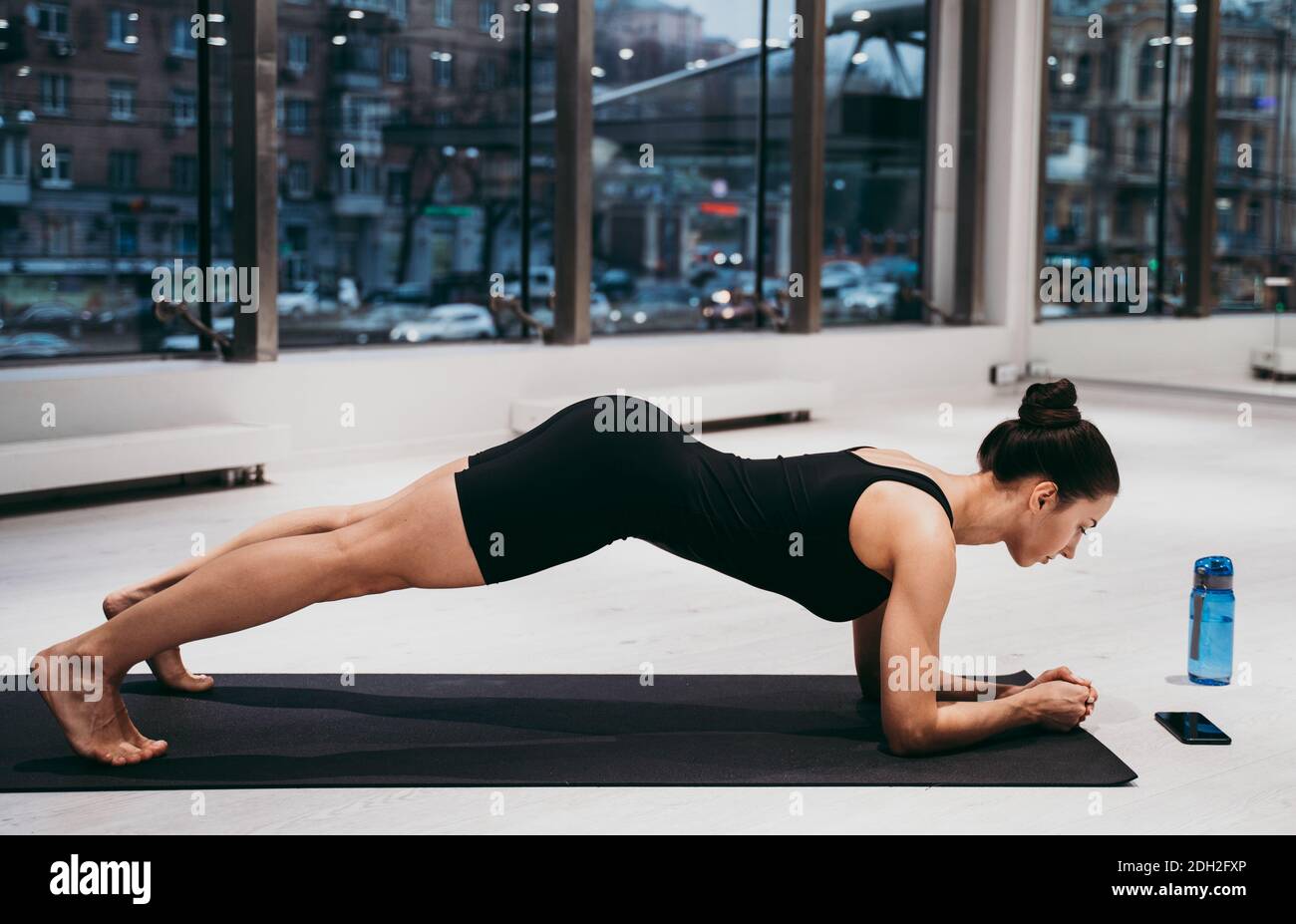 Beautiful girl training in the gym. Russian classic dancer doing ...