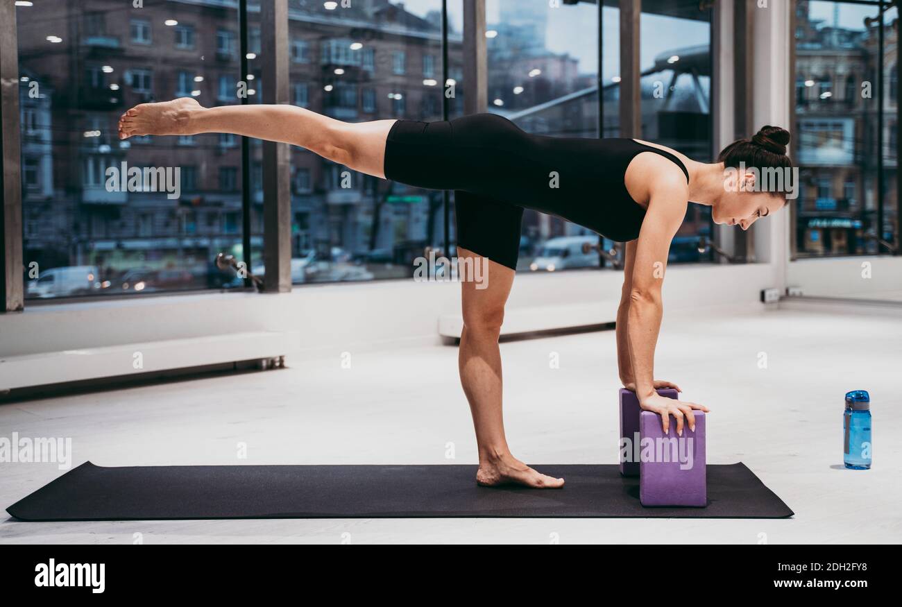 Beautiful girl training in the gym. Russian classic dancer doing ...