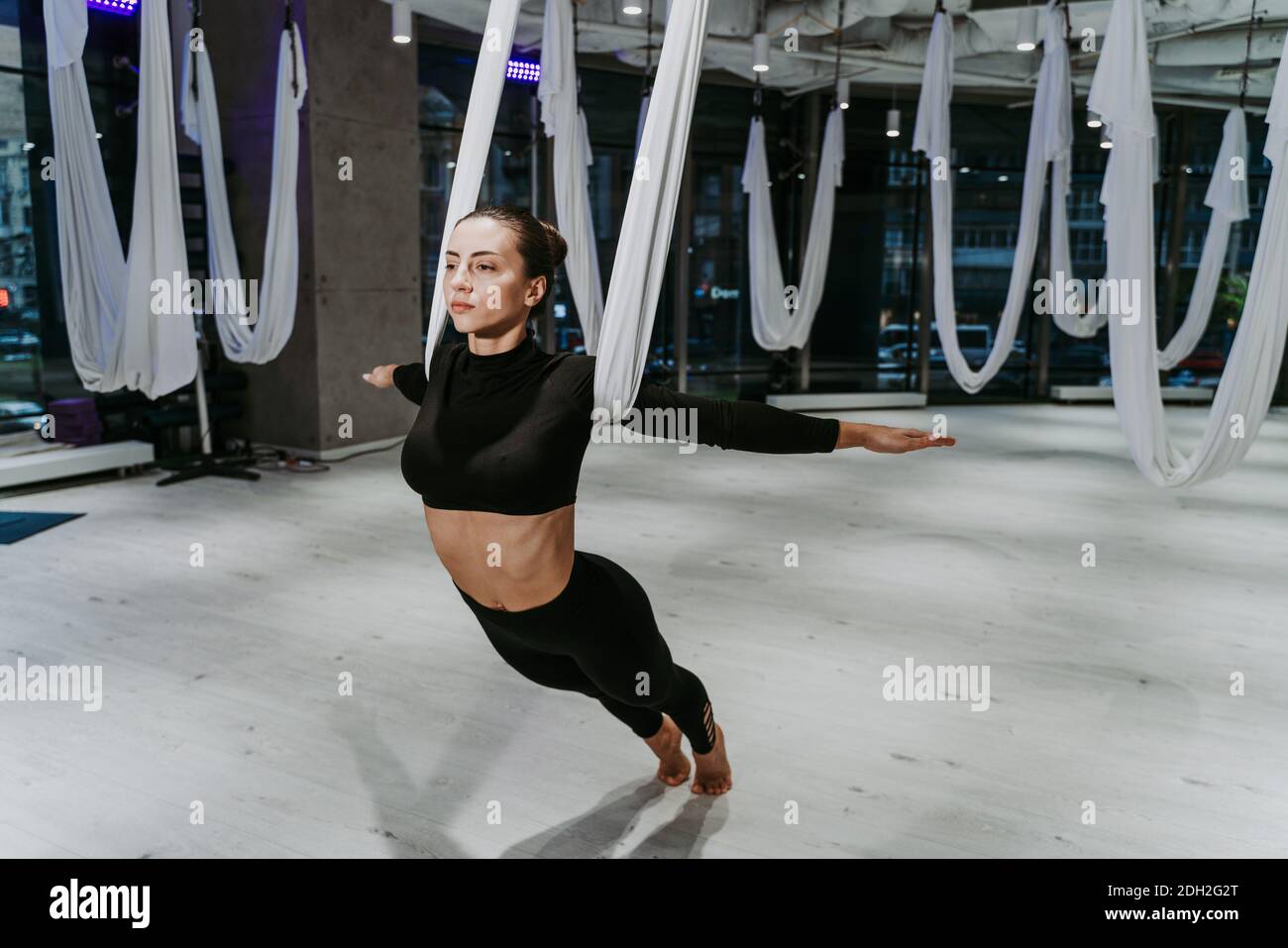 Beautiful girl training in the gym. Russian classic dancer doing ...