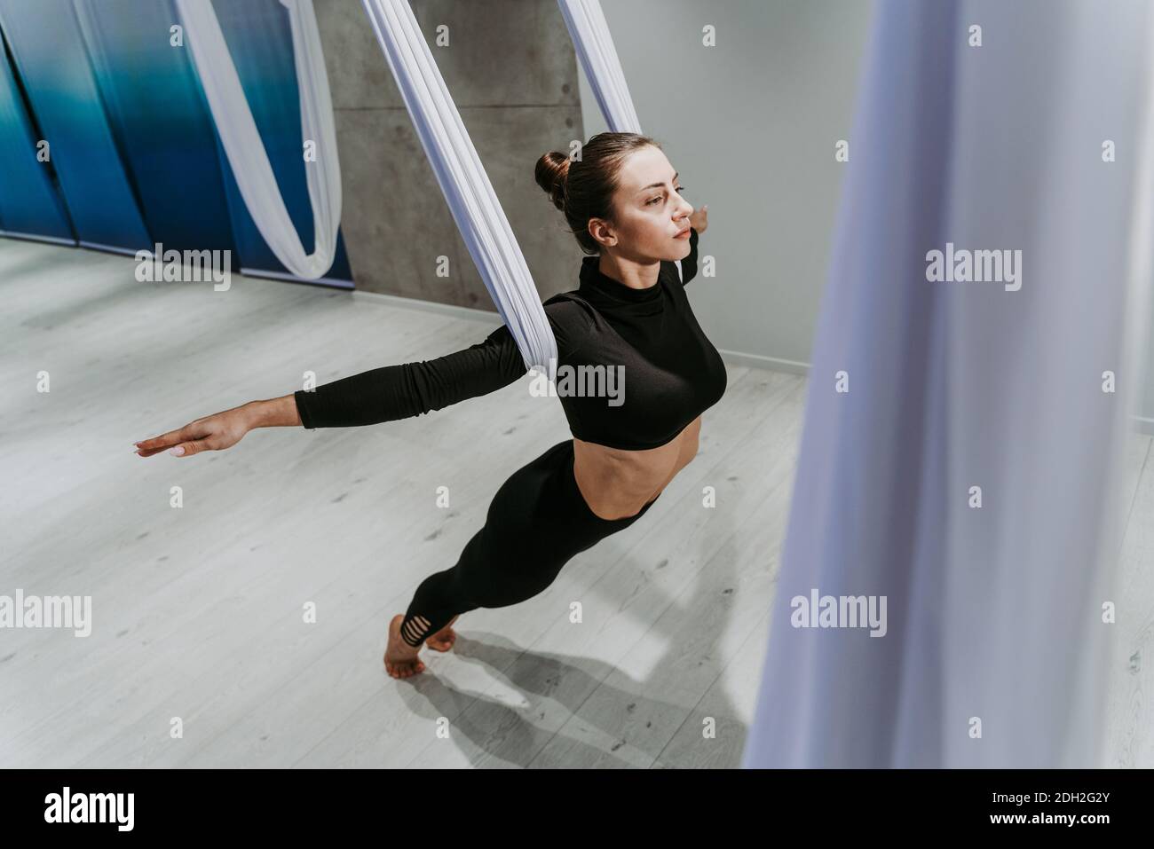 Beautiful girl training in the gym. Russian classic dancer doing ...