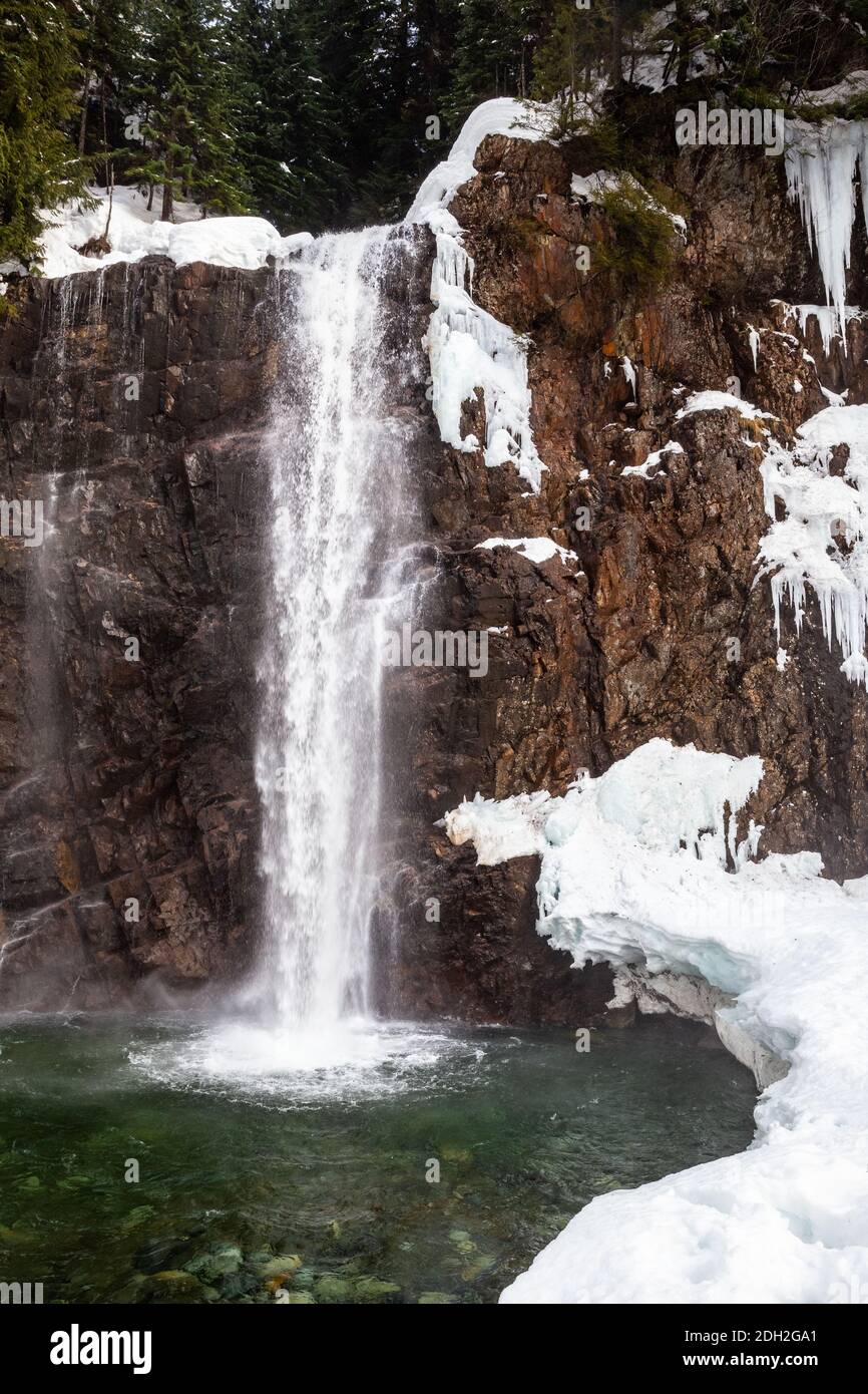 A vertical shot of a Franklin Falls in winter in Washington Stock Photo - Alamy