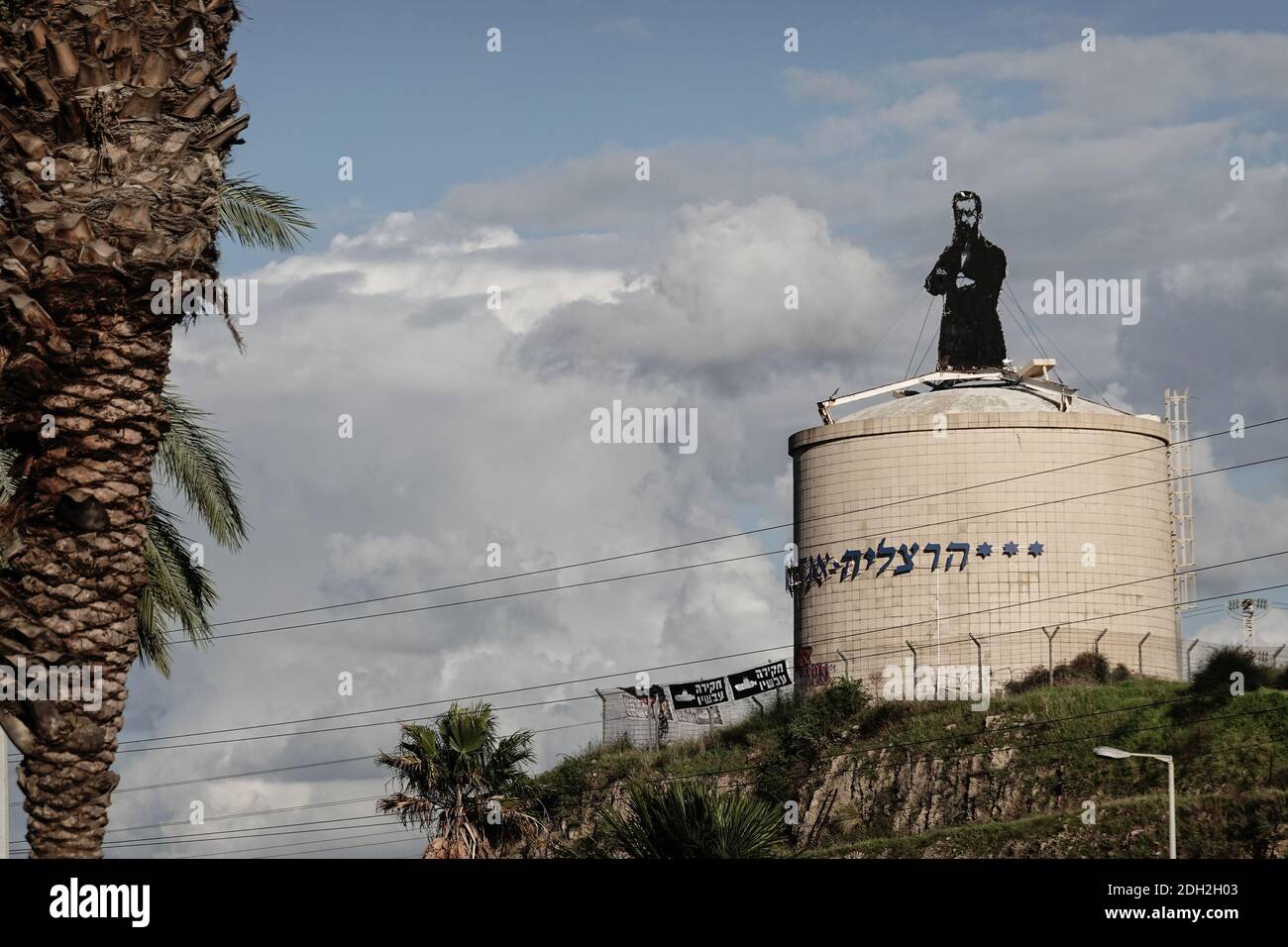 A sculpture of Theadore Herzl atop a water reservoir stands at the Sira ...