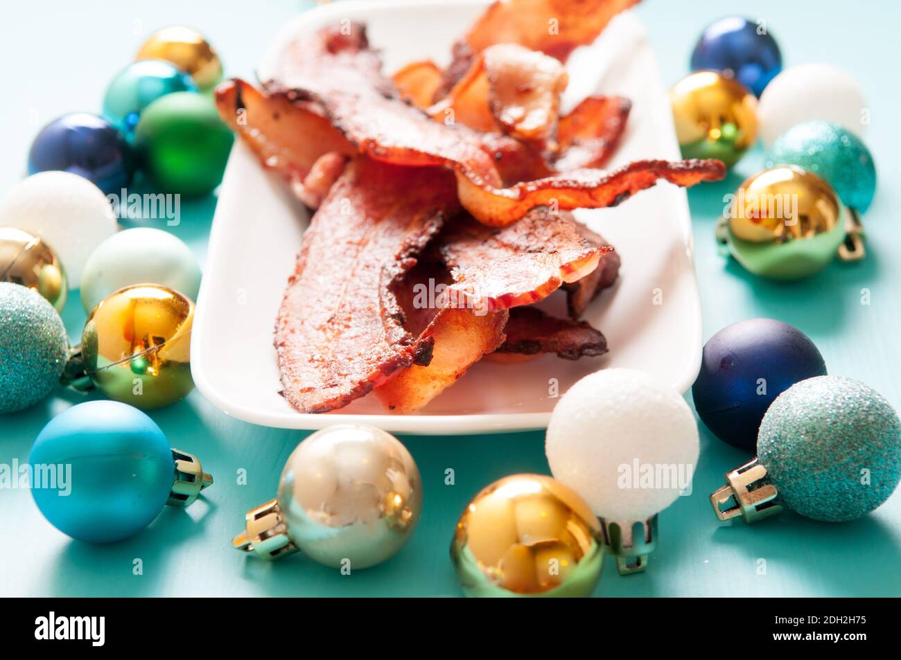 crisp bacon strips with christmas decorations, holiday bacon, the best ...