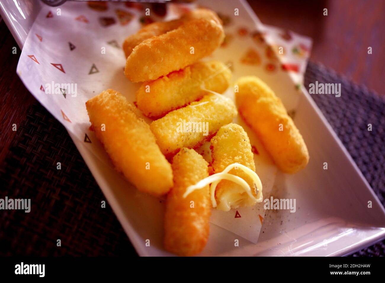 Photo of retro delicious cheese sticks in a cafe for lunch. Example of ...