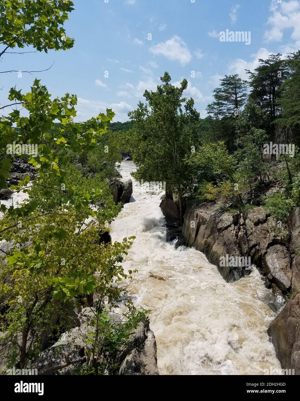 The Potomac river rapids swollen by heavy rains, at the Great Falls, in ...