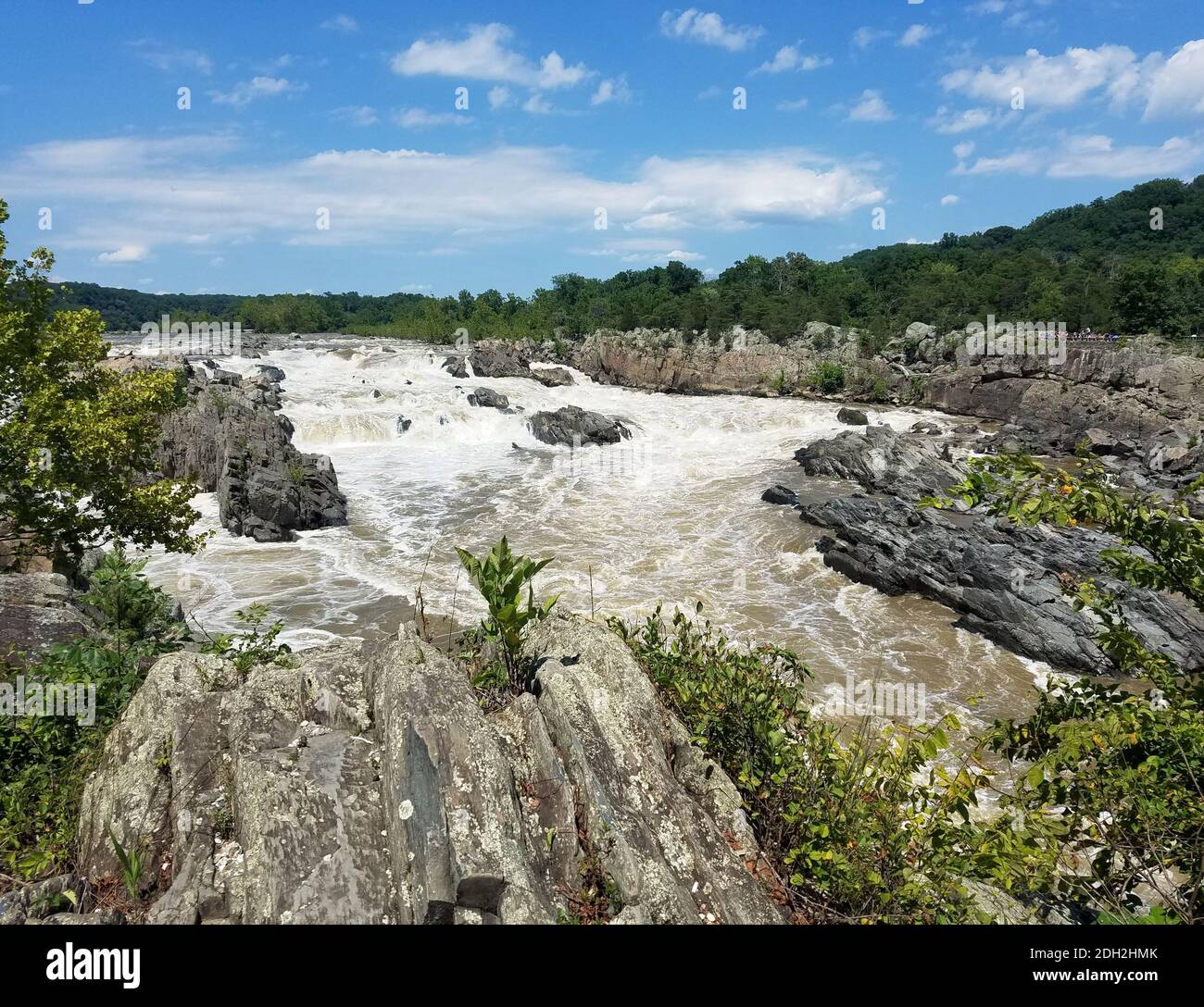 The Potomac river rapids swollen by heavy rains, at the Great Falls, in ...