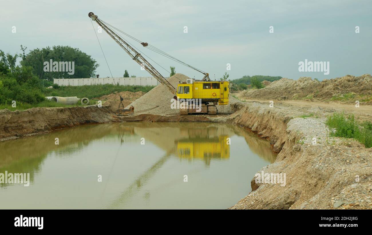 Mining for gravel sand pit excavator or digger machine dredger ...