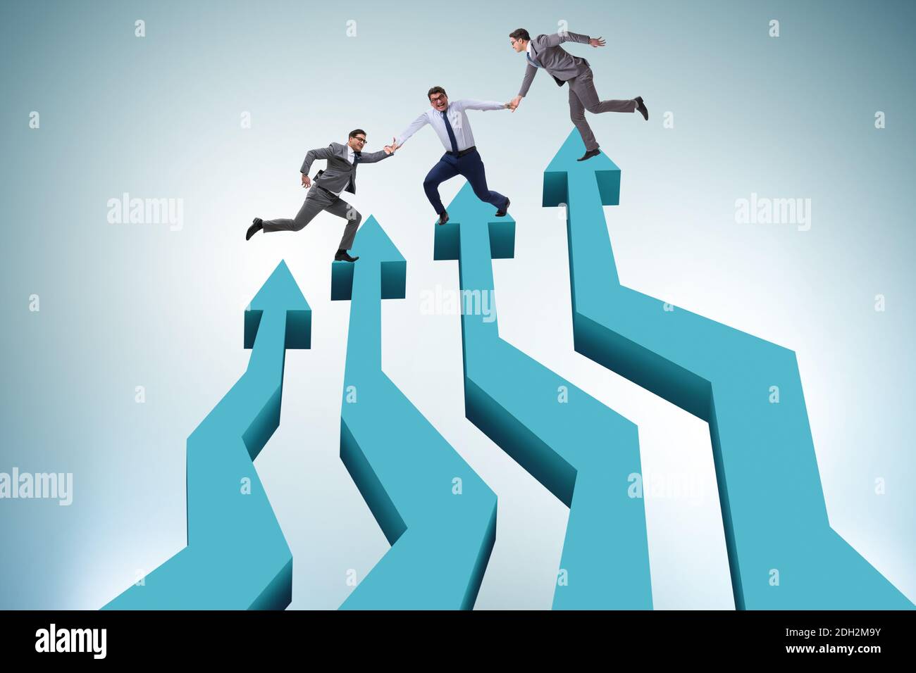 Colleagues helping each other to improve results Stock Photo - Alamy