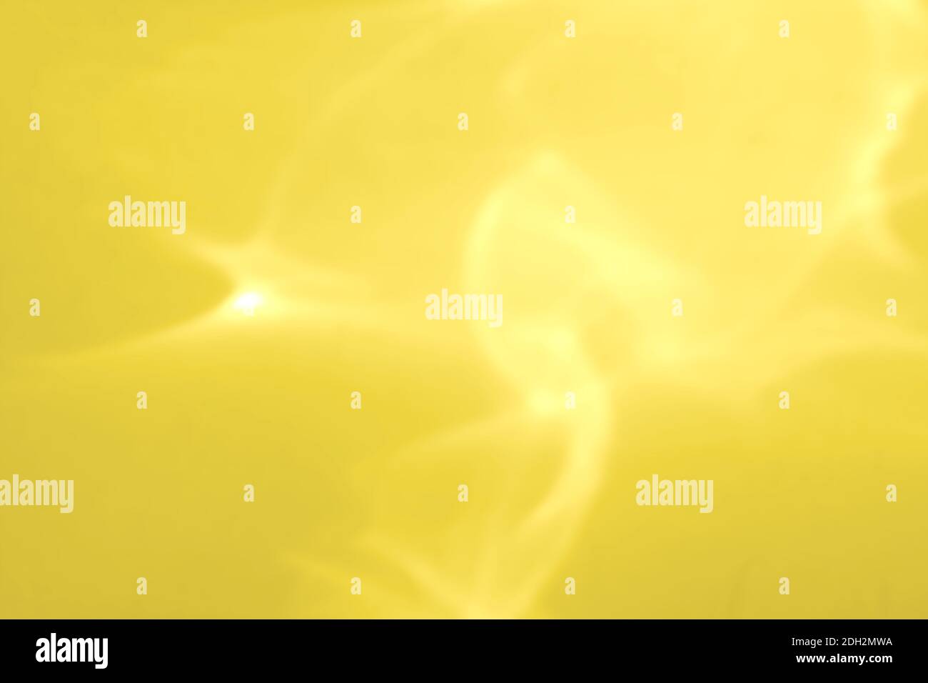 Abstract glass reflection yellow background. Neon illuminating foil in ...