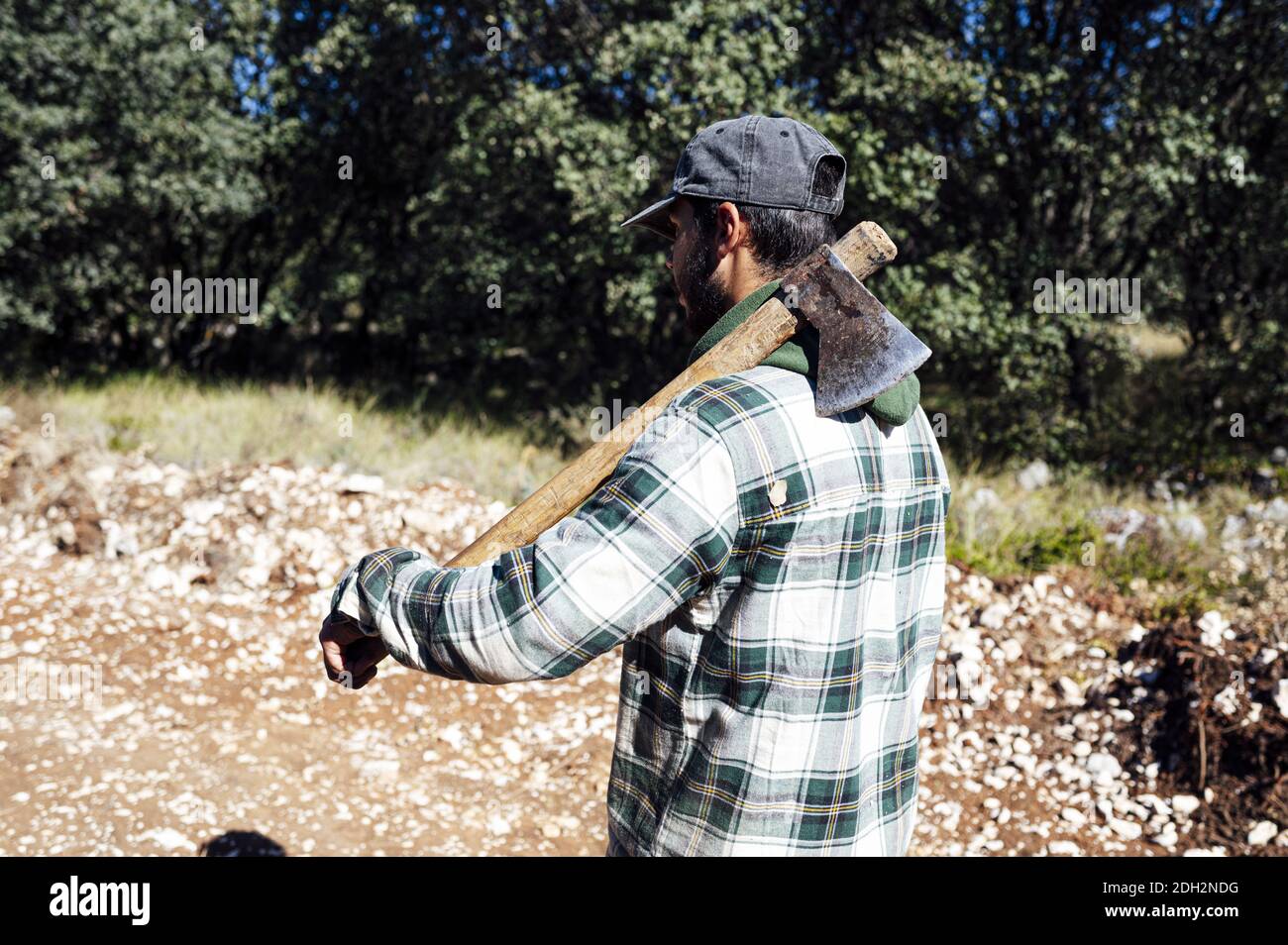 Shot man holding ax hi-res stock photography and images - Alamy