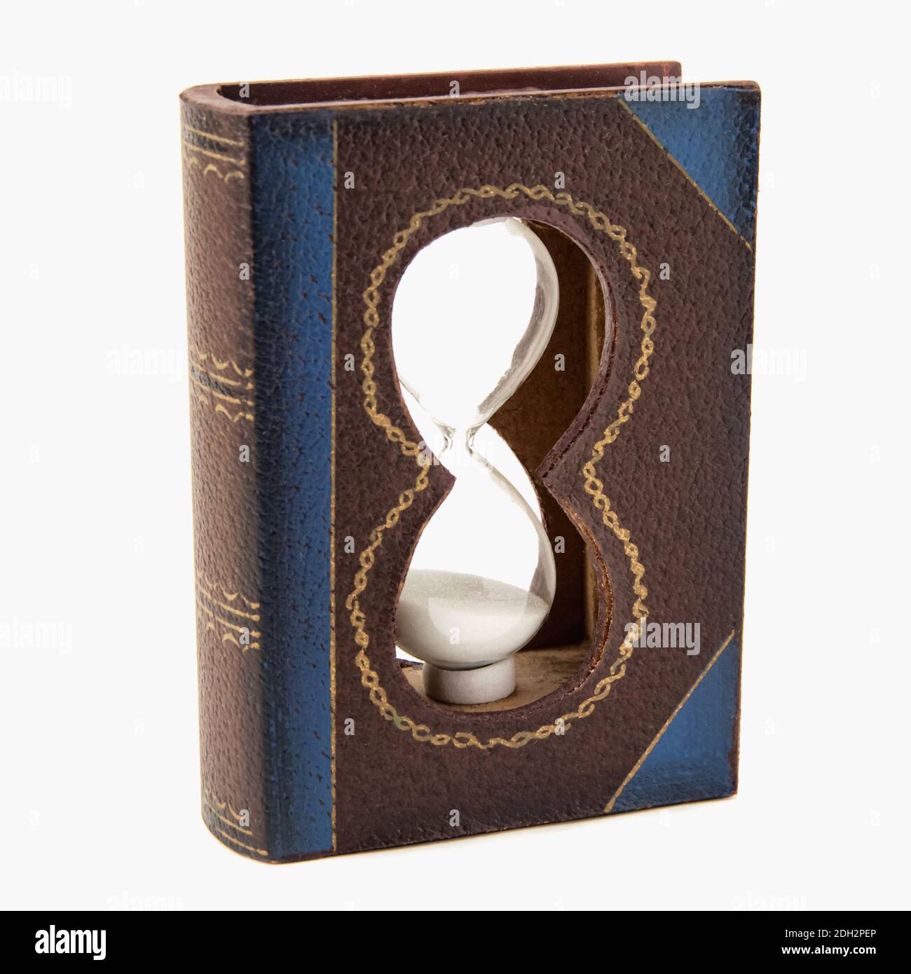 Hourglass in the form of a book isolated on a white background. Close ...
