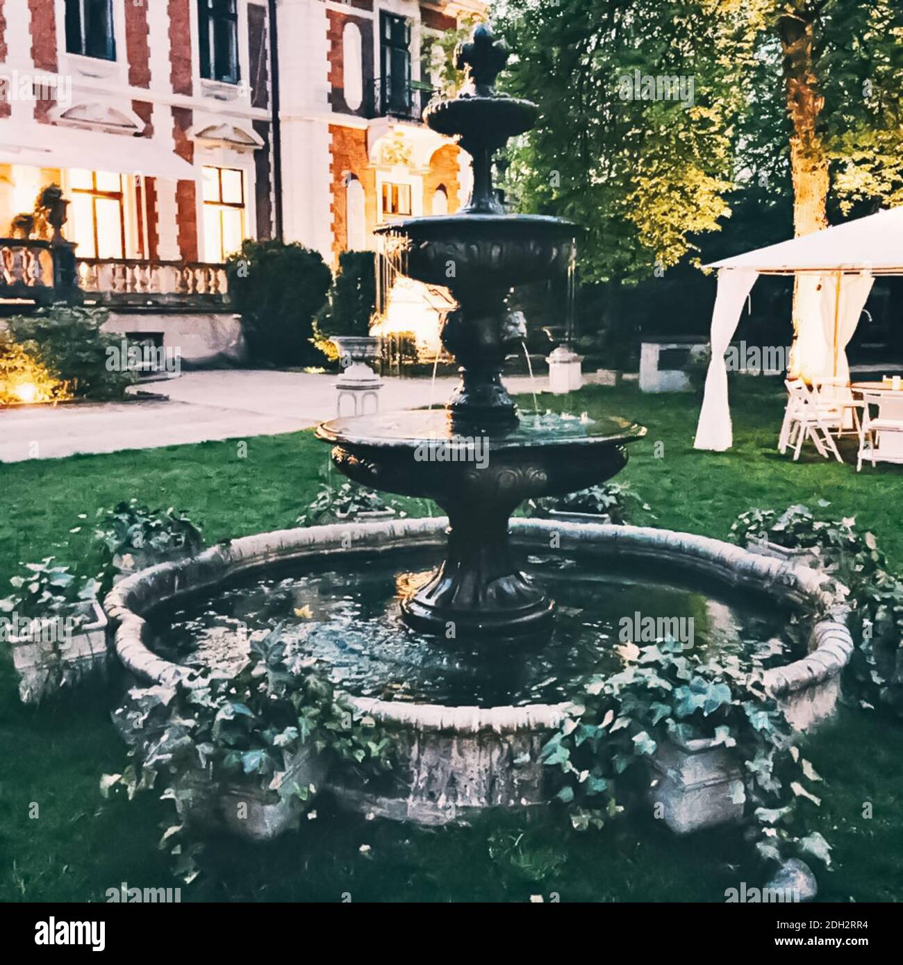 Fountain in a garden of a luxury restaurant Stock Photo - Alamy