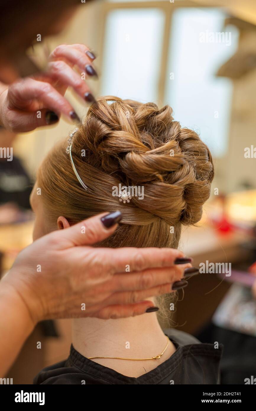 Professional hairdresser doing hairstyle young hi-res stock photography ...