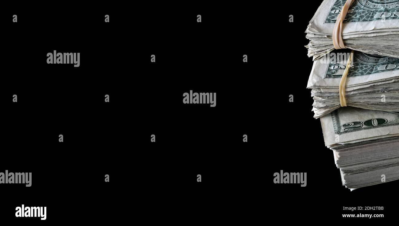 Wealth and riches represented by cash money panoramic on black ...