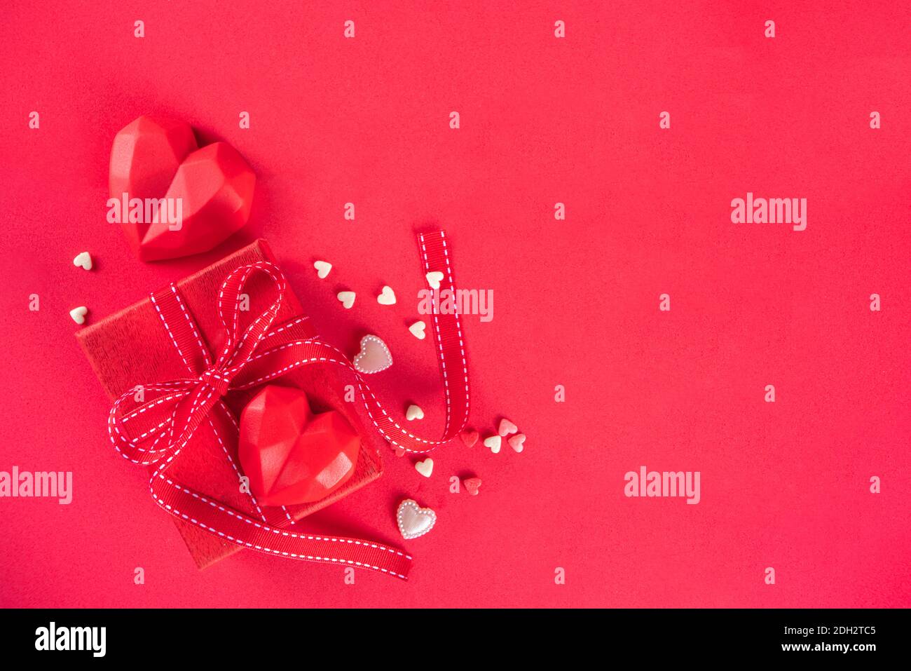 Valentine greeting card background, with gift box festive ribbons ...