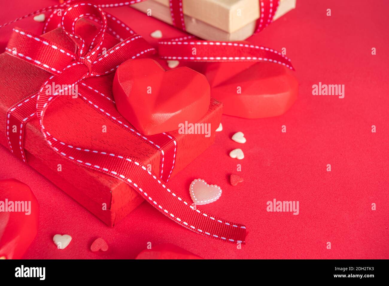 Valentine greeting card background, with gift box festive ribbons ...