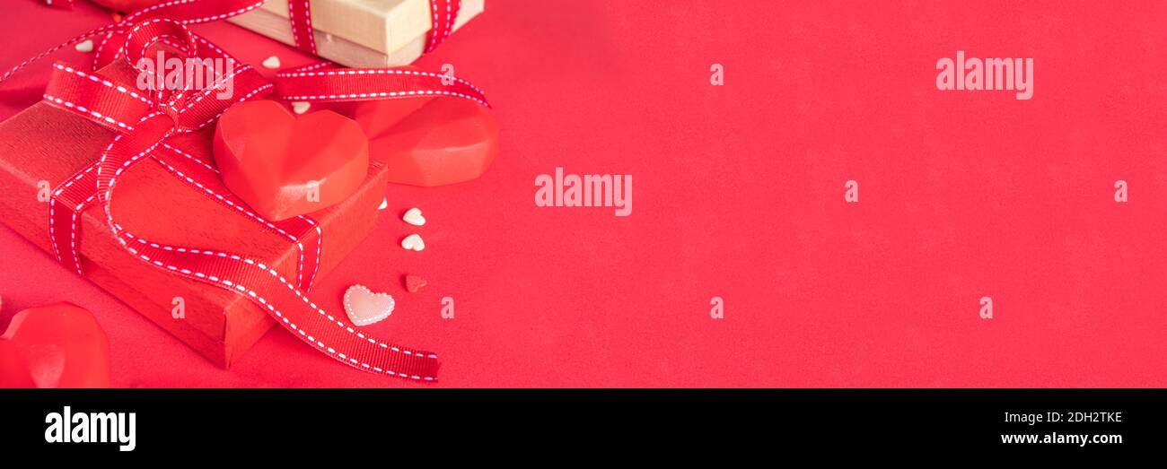 Valentine greeting card background, with gift box festive ribbons ...