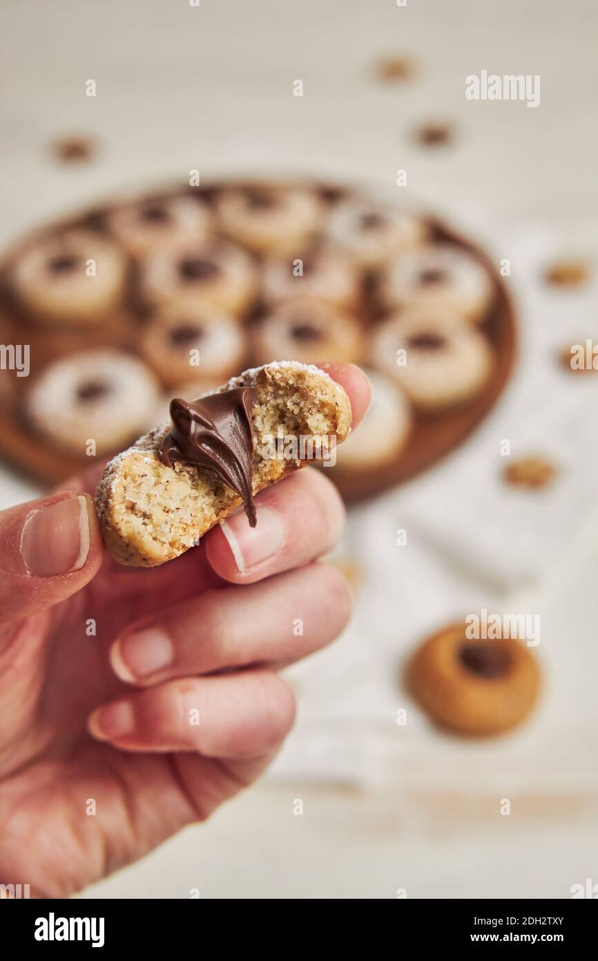 A vertical shot of delicious Christmas cookies with chocolate on a ...