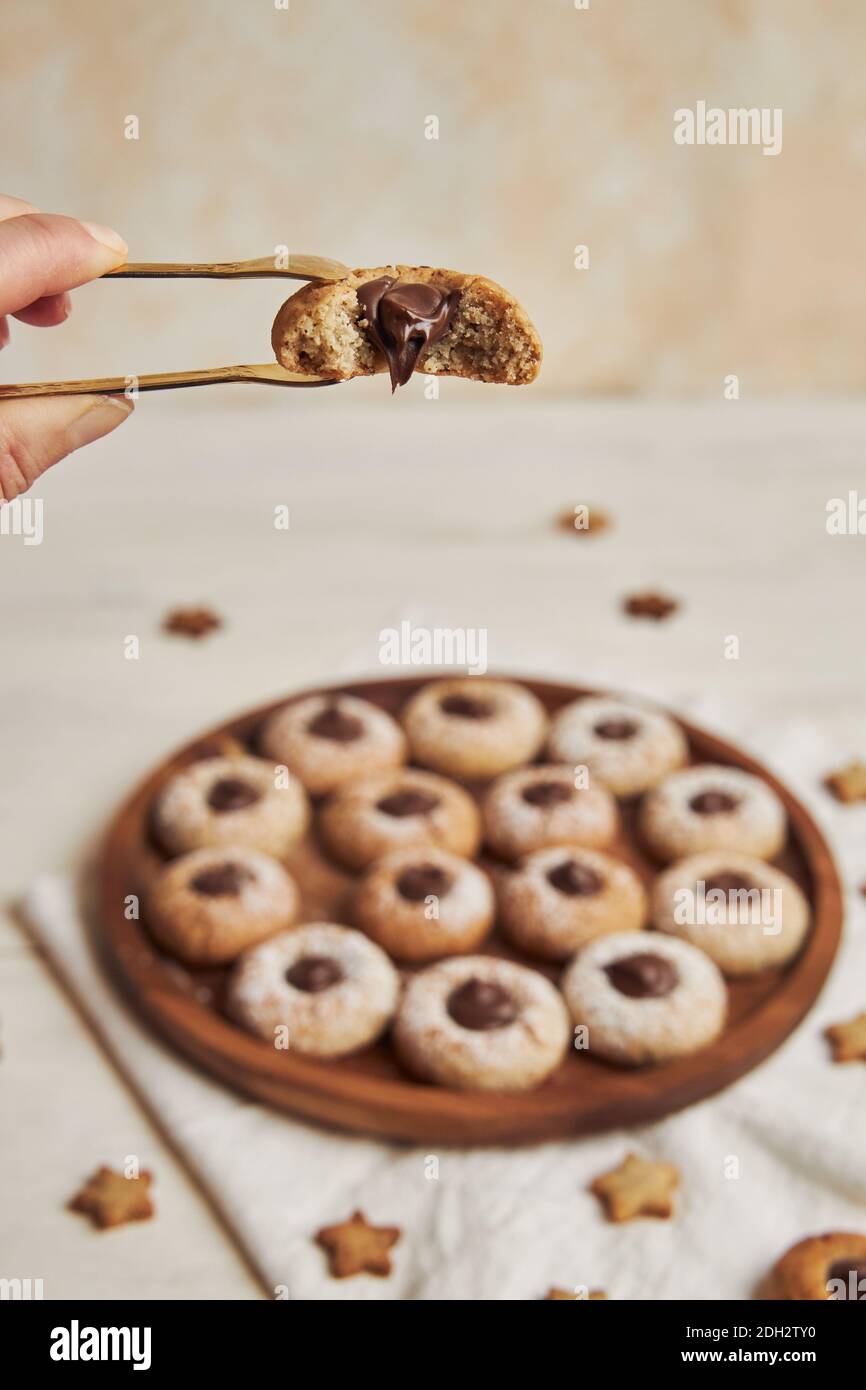 A vertical shot of delicious Christmas cookies with chocolate on a ...
