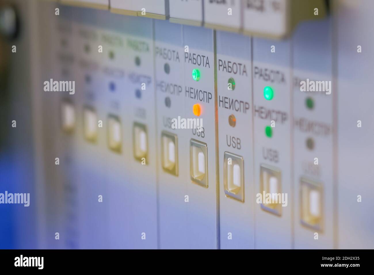 Lighting status indicator signals on electric control panel of machine ...