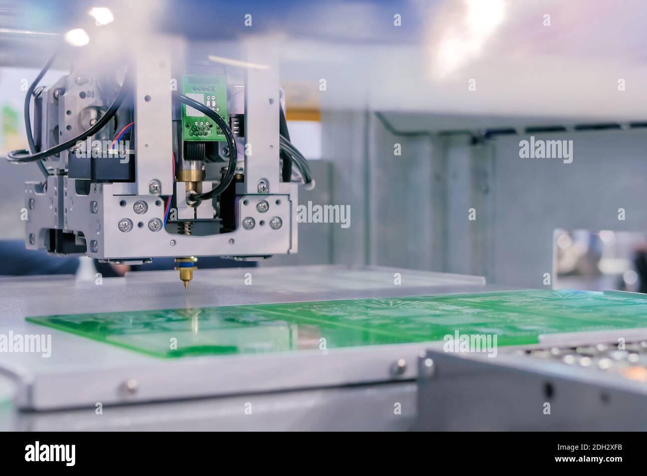 SMD pick and place machine assembling computer circuit board - front ...