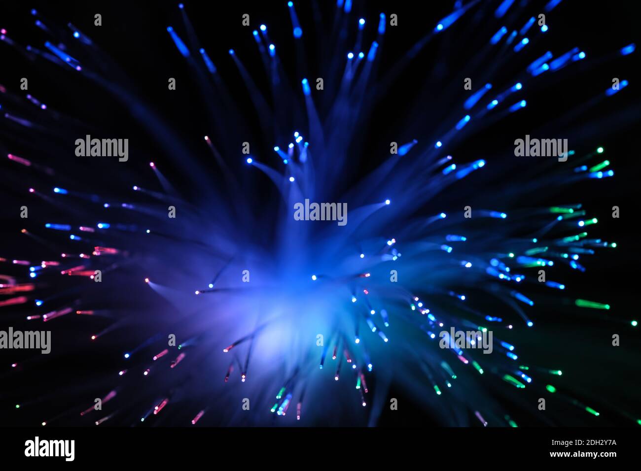 Optical fiber network cable on black background Stock Photo - Alamy