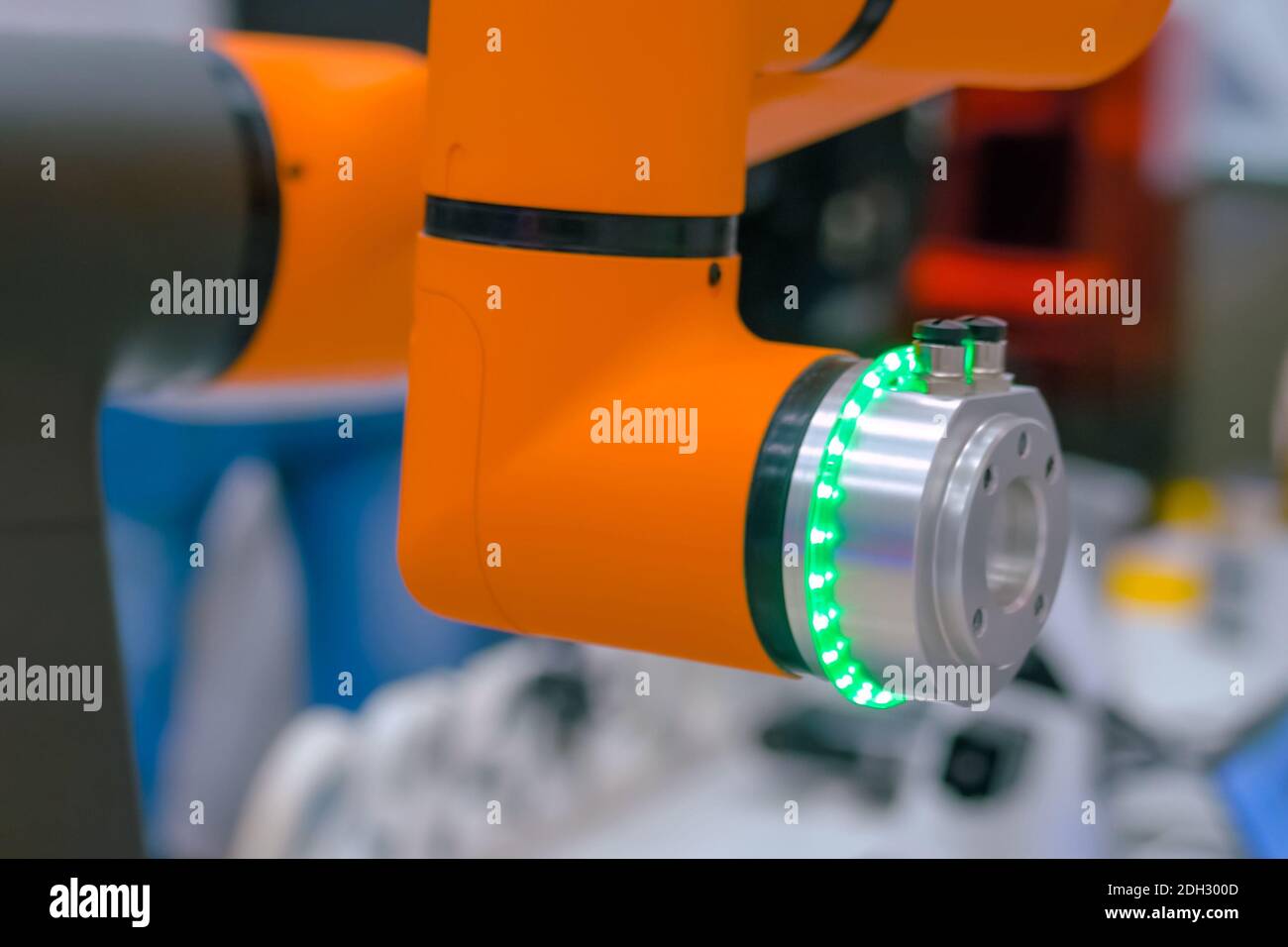 Orange collaborative robot moving at robotic exhibition: close up Stock ...