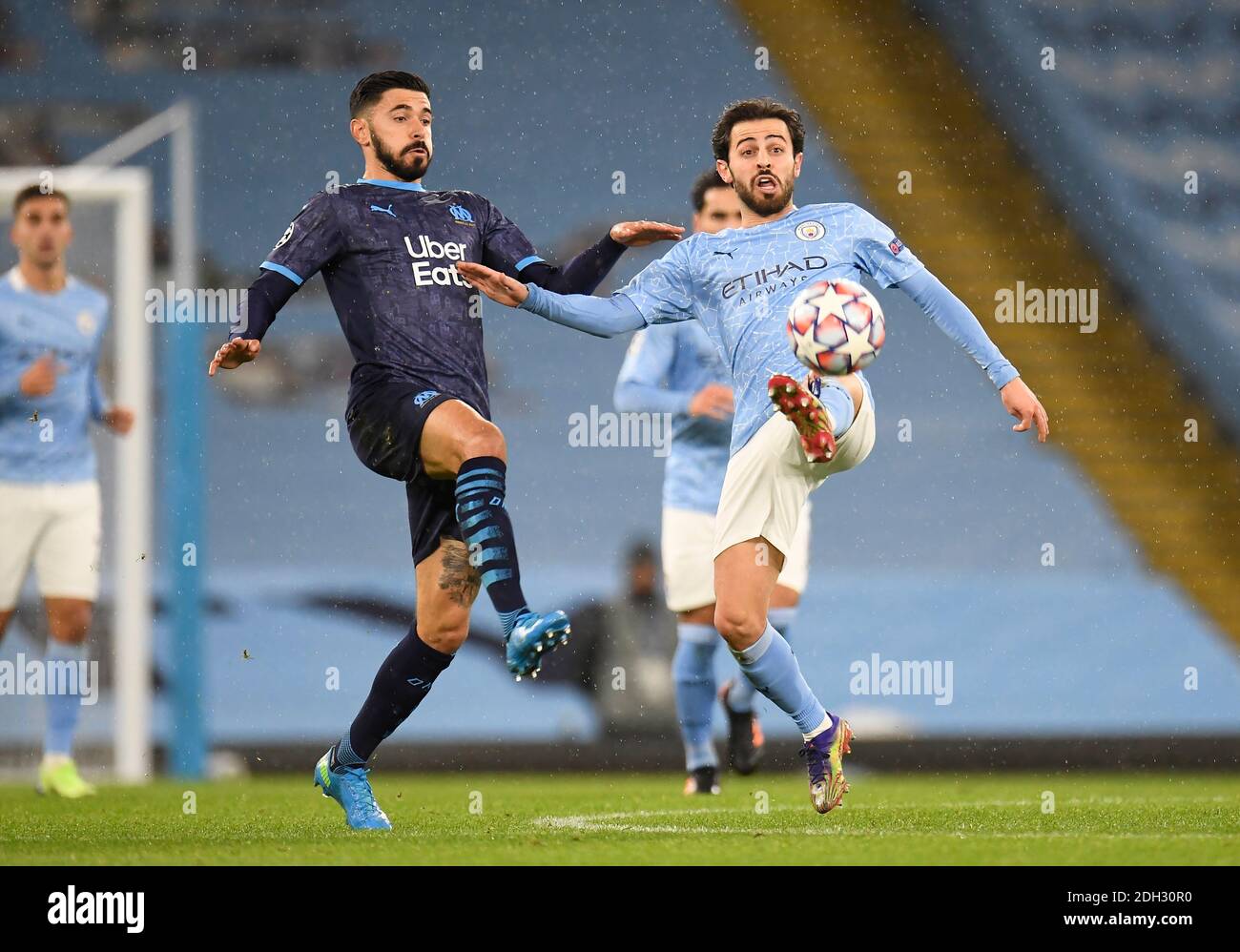 Marseille's Morgan Sanson (left) and Manchester City's Bernardo Silva ...