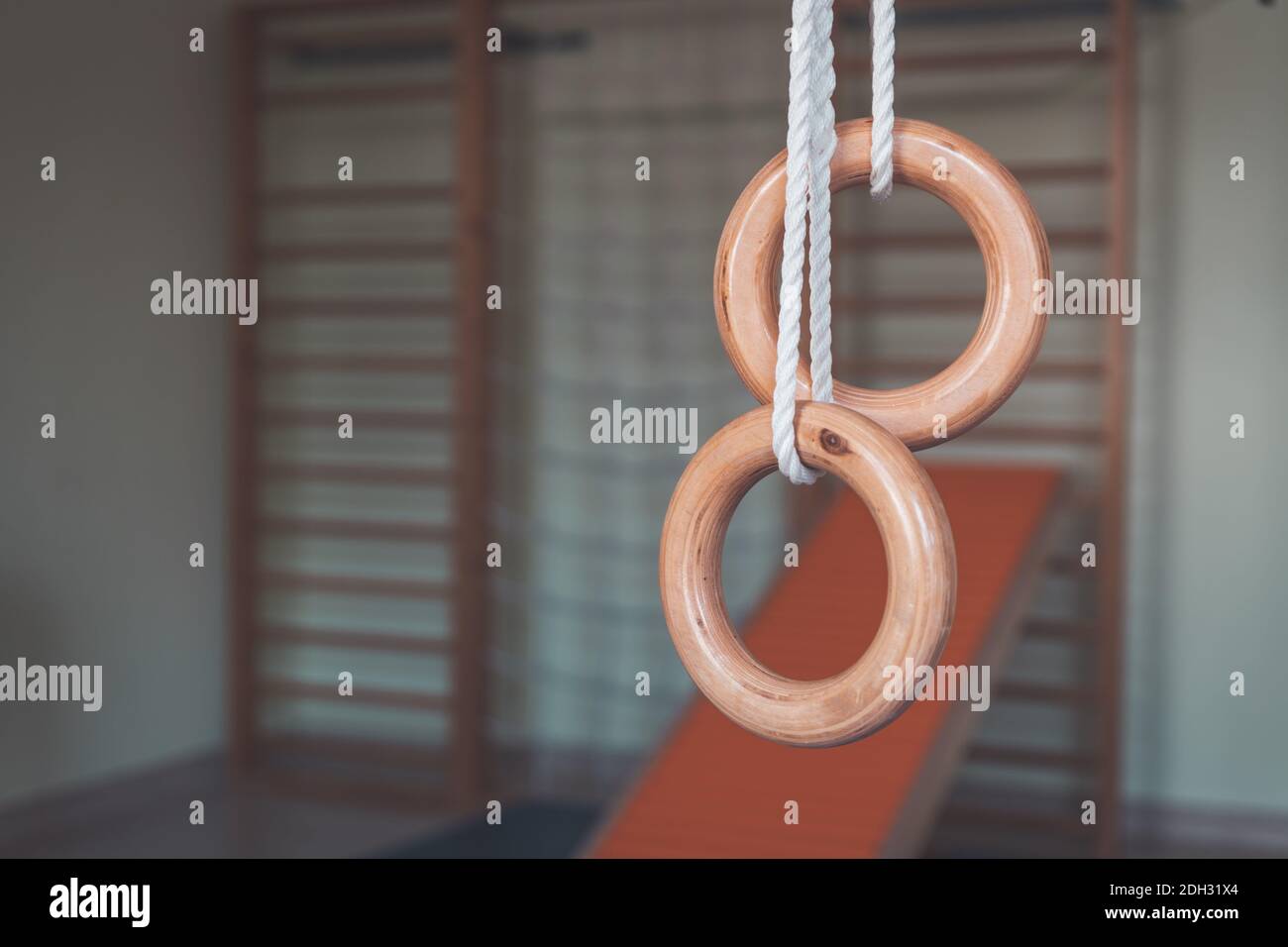Physical education concept: Gym rings in gym hall of Kindergarten Stock ...