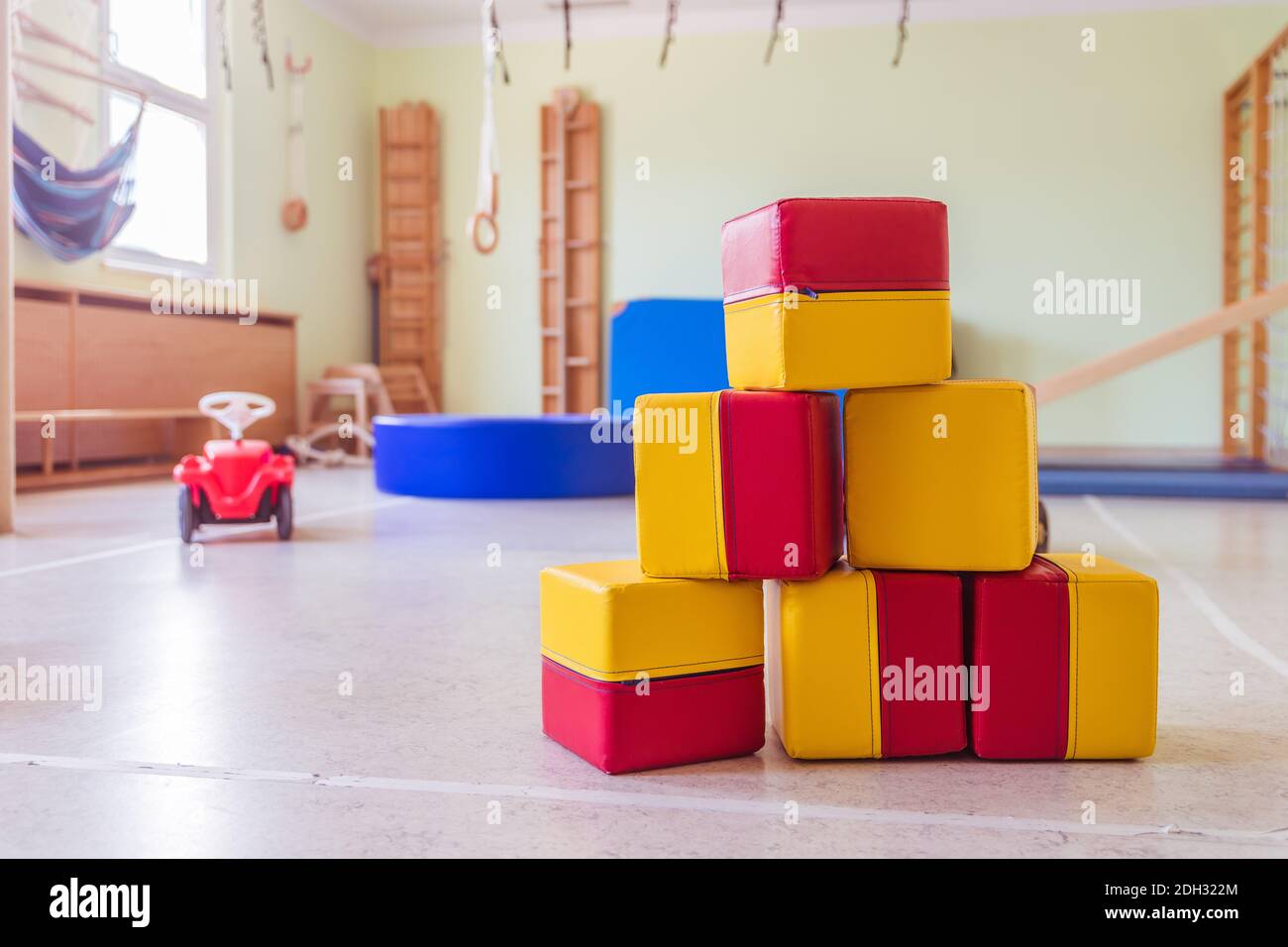 Toy foam cubes in gym hall of a pre school Stock Photo - Alamy