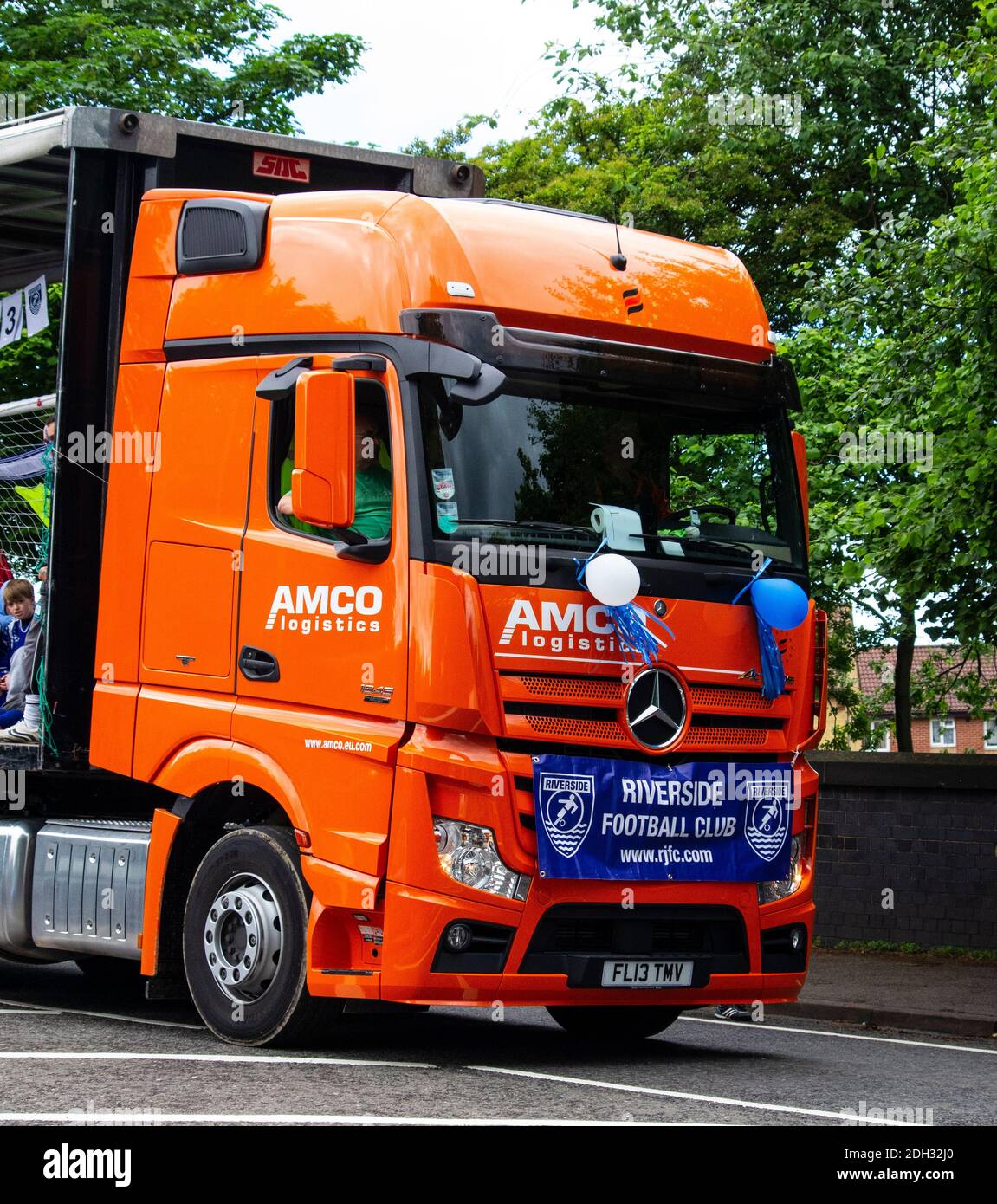 Big orange lorry unit in a carnival Stock Photo - Alamy